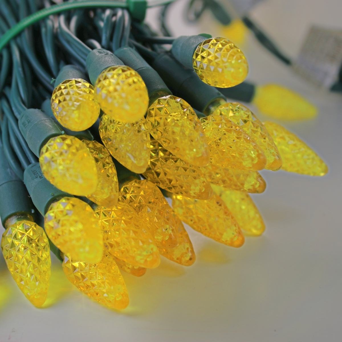 50-light C6 Yellow LED Christmas Lights, 4" Spacing Green Wire ...