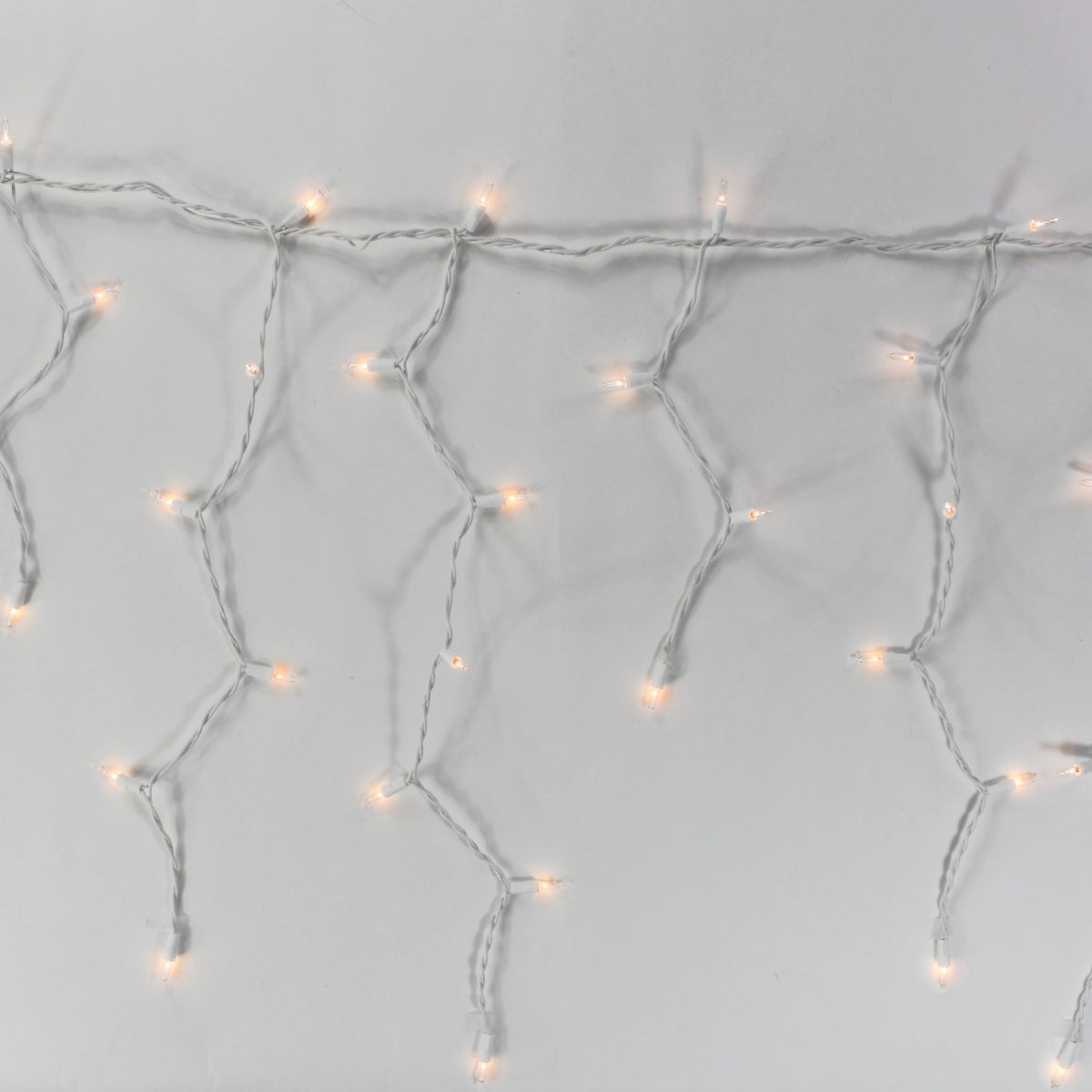 150-bulb Clear Glass Icicle Lights, White Wire – Christmas Light Source