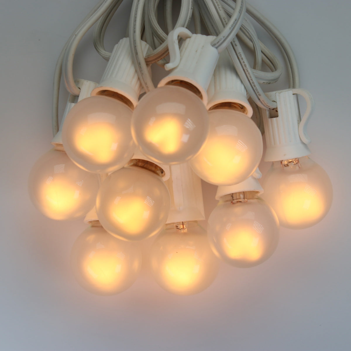 G30 White Satin Glass Bulbs E12 Bases (25 Pack) – Christmas Light Source