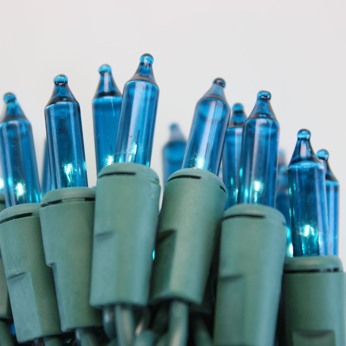 100-bulb Teal Mini Lights, 6" Spacing, Green Wire – Christmas Light Source