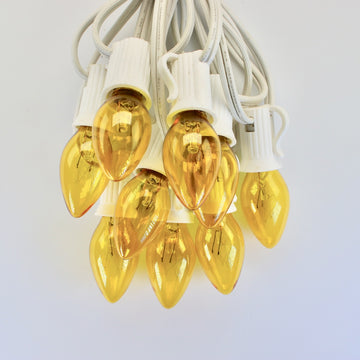 C7 Yellow Glass Bulbs E12 Bases (25 Pack) – Christmas Light Source